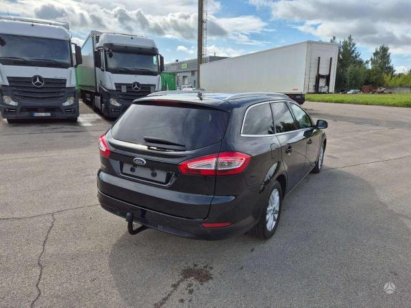 Ford Mondeo 2014 in Panevezys on AUTOMOTO.COM.LV Black Ford Mondeo 2014 in Panevezys, with an engine capacity of 2.00 L and mileage of 289 thousand km for 4350 €, photo 4 on AUTOMOTO.COM.LV