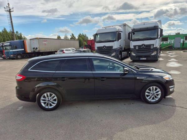 Ford Mondeo 2014 in Panevezys on AUTOMOTO.COM.LV Black Ford Mondeo 2014 in Panevezys, with an engine capacity of 2.00 L and mileage of 289 thousand km for 4350 €, photo 5 on AUTOMOTO.COM.LV
