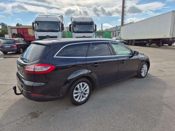 Ford Mondeo 2014 in Panevezys on AUTOMOTO.COM.LV Black Ford Mondeo 2014 in Panevezys, with an engine capacity of 2.00 L and mileage of 289 thousand km for 4350 €, photo 8 on AUTOMOTO.COM.LV