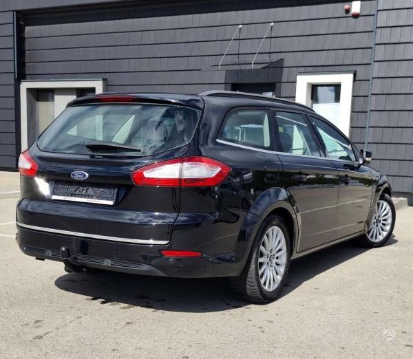 Ford Mondeo 2014 in Kaunas on AUTOMOTO.COM.LV Black Ford Mondeo 2014 in Kaunas, with an engine capacity of 1.56 L and mileage of 292 thousand km for 3699 €, photo 3 on AUTOMOTO.COM.LV