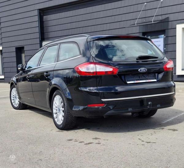 Ford Mondeo 2014 in Kaunas on AUTOMOTO.COM.LV Black Ford Mondeo 2014 in Kaunas, with an engine capacity of 1.56 L and mileage of 292 thousand km for 3699 €, photo 7 on AUTOMOTO.COM.LV