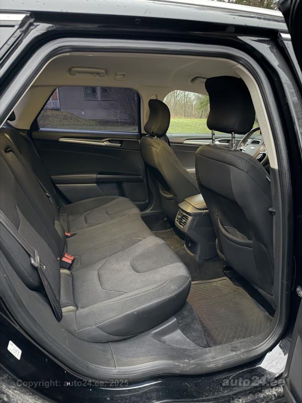 Black Ford Mondeo 2015 in Viljandi, with an engine capacity of 2.00 L and mileage of 281 thousand km for 7700 €, photo 11 on AUTOMOTO.COM.LV