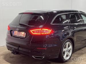 Black Ford Mondeo 2015 in Jurmala, with an engine capacity of 2.00 L and mileage of 284 thousand km for 8995 €, photo 9 on AUTOMOTO.COM.LV