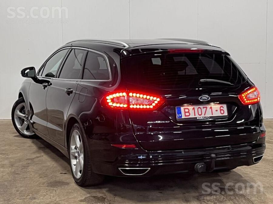 Black Ford Mondeo 2015 in Jurmala, with an engine capacity of 2.00 L and mileage of 284 thousand km for 8995 €, photo 11 on AUTOMOTO.COM.LV