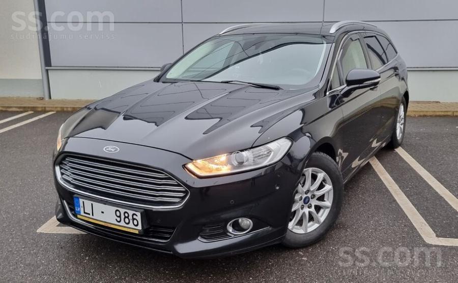 Black Ford Mondeo 2015 in Riga, with an engine capacity of 1.60 L and mileage of 238 thousand km for 6990 €, photo 1 on AUTOMOTO.COM.LV