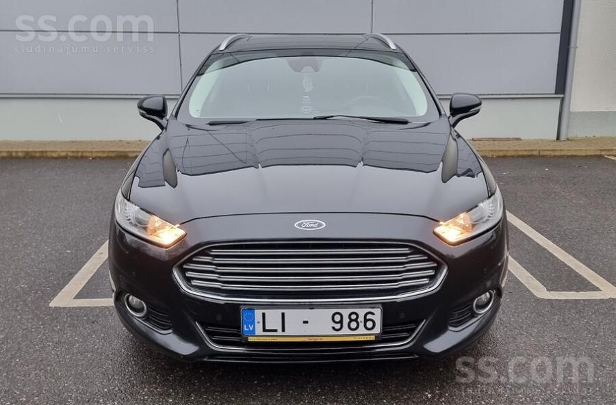 Black Ford Mondeo 2015 in Riga, with an engine capacity of 1.60 L and mileage of 238 thousand km for 6990 €, photo 2 on AUTOMOTO.COM.LV