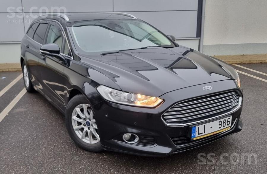 Black Ford Mondeo 2015 in Riga, with an engine capacity of 1.60 L and mileage of 238 thousand km for 6990 €, photo 3 on AUTOMOTO.COM.LV