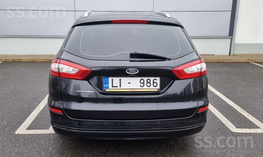 Black Ford Mondeo 2015 in Riga, with an engine capacity of 1.60 L and mileage of 238 thousand km for 6990 €, photo 6 on AUTOMOTO.COM.LV