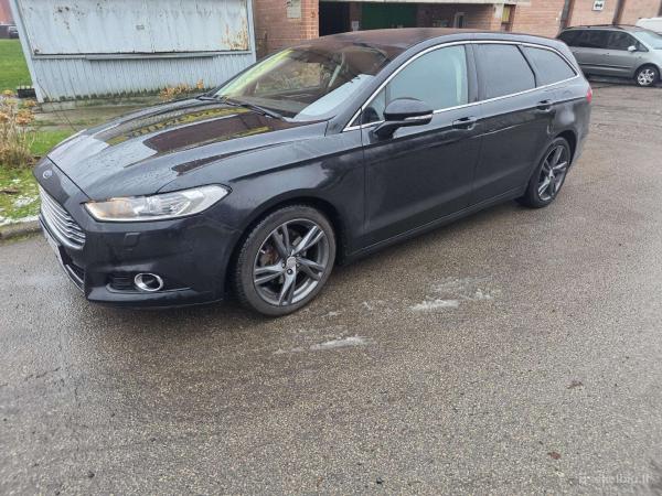 Black Ford Mondeo 2015 in Klaipeda, with an engine capacity of 2.00 L and mileage of 250 thousand km for 5900 €, photo 1 on AUTOMOTO.COM.LV