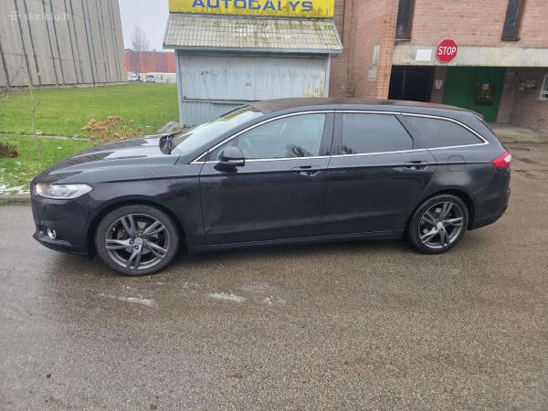 Black Ford Mondeo 2015 in Klaipeda, with an engine capacity of 2.00 L and mileage of 250 thousand km for 5900 €, photo 3 on AUTOMOTO.COM.LV