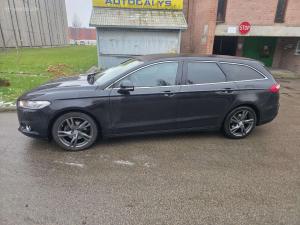Black Ford Mondeo 2015 in Klaipeda, with an engine capacity of 2.00 L and mileage of 250 thousand km for 5900 €, photo 3 on AUTOMOTO.COM.LV