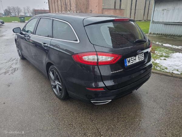 Black Ford Mondeo 2015 in Klaipeda, with an engine capacity of 2.00 L and mileage of 250 thousand km for 5900 €, photo 4 on AUTOMOTO.COM.LV