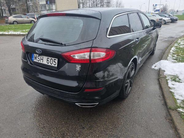 Black Ford Mondeo 2015 in Klaipeda, with an engine capacity of 2.00 L and mileage of 250 thousand km for 5900 €, photo 5 on AUTOMOTO.COM.LV