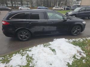 Black Ford Mondeo 2015 in Klaipeda, with an engine capacity of 2.00 L and mileage of 250 thousand km for 5900 €, photo 6 on AUTOMOTO.COM.LV