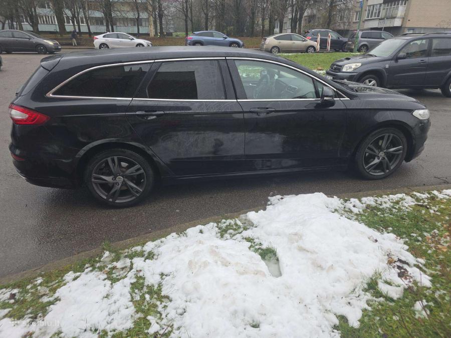 Black Ford Mondeo 2015 in Klaipeda, with an engine capacity of 2.00 L and mileage of 250 thousand km for 5900 €, photo 6 on AUTOMOTO.COM.LV