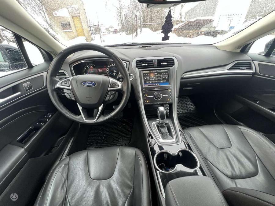 Black Ford Mondeo 2015 in Utena, with an engine capacity of 2.00 L and mileage of 337 thousand km for 6100 €, photo 21 on AUTOMOTO.COM.LV