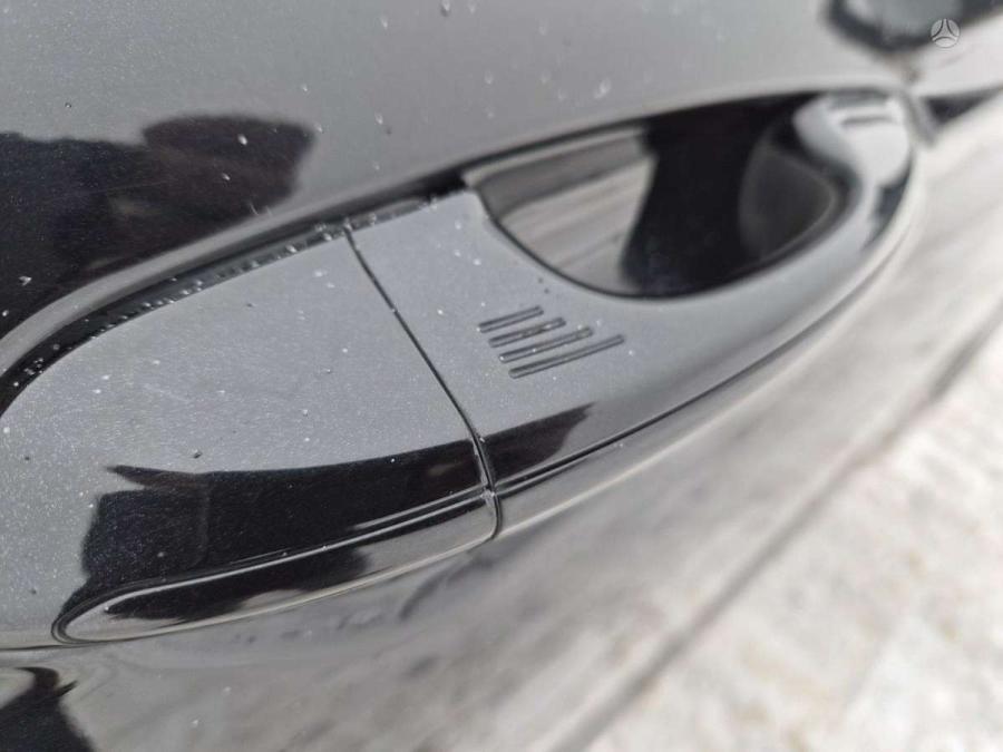 Black Ford Mondeo 2015 in Vilnius, with an engine capacity of 2.00 L and mileage of 249 thousand km for 7800 €, photo 14 on AUTOMOTO.COM.LV