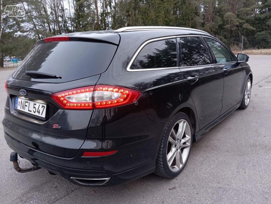 Black Ford Mondeo 2015 in Ukmerge, with an engine capacity of 2.00 L and mileage of 249 thousand km for 7100 €, photo 5 on AUTOMOTO.COM.LV