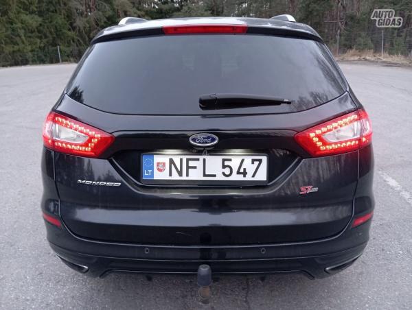 Black Ford Mondeo 2015 in Ukmerge, with an engine capacity of 2.00 L and mileage of 249 thousand km for 7100 €, photo 6 on AUTOMOTO.COM.LV