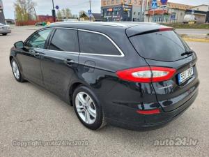 Black Ford Mondeo 2015 in Tartu, with an engine capacity of 2.00 L and mileage of 232 thousand km for 8299 €, photo 5 on AUTOMOTO.COM.LV
