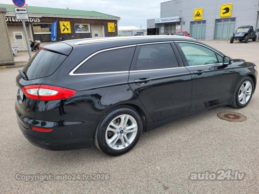 Black Ford Mondeo 2015 in Tartu, with an engine capacity of 2.00 L and mileage of 232 thousand km for 8299 €, photo 6 on AUTOMOTO.COM.LV