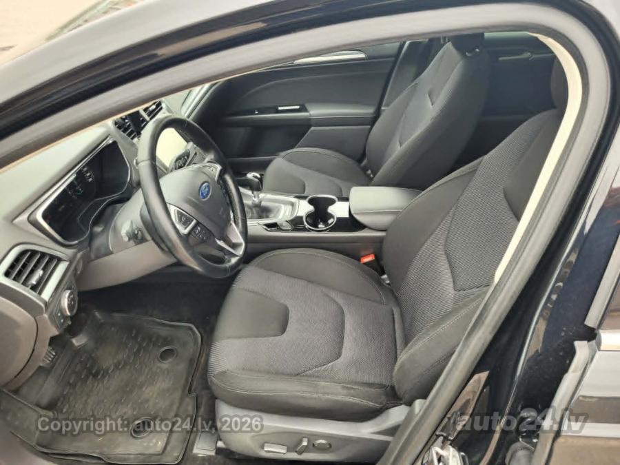 Black Ford Mondeo 2015 in Tartu, with an engine capacity of 2.00 L and mileage of 232 thousand km for 8299 €, photo 7 on AUTOMOTO.COM.LV