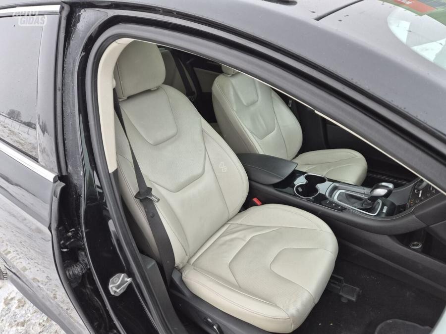 Black Ford Mondeo 2015 in Vilnius, with an engine capacity of 2.00 L and mileage of 249 thousand km for 7100 €, photo 12 on AUTOMOTO.COM.LV