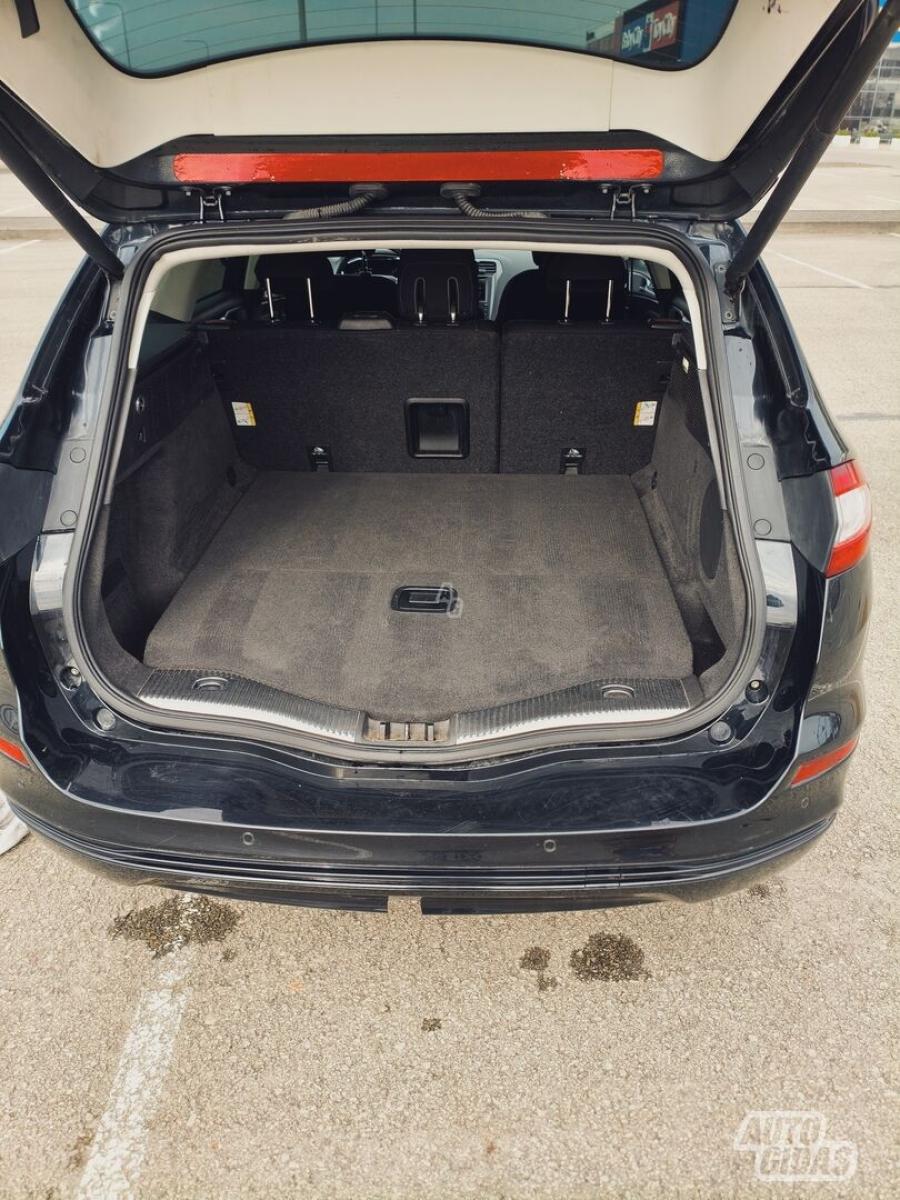 Black Ford Mondeo 2015 in Klaipeda, with an engine capacity of 2.00 L and mileage of 288 thousand km for 5900 €, photo 7 on AUTOMOTO.COM.LV