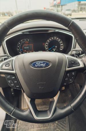 Black Ford Mondeo 2015 in Klaipeda, with an engine capacity of 2.00 L and mileage of 288 thousand km for 5900 €, photo 8 on AUTOMOTO.COM.LV