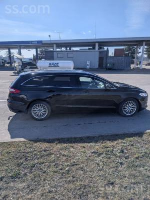 Black Ford Mondeo 2015 in Cesis, with an engine capacity of 2.00 L and mileage of 380 thousand km for 7255 €, photo 5 on AUTOMOTO.COM.LV