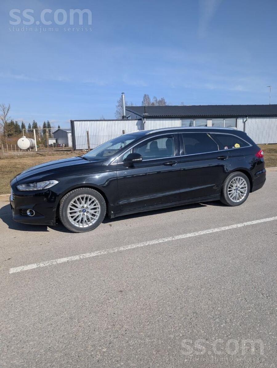 Black Ford Mondeo 2015 in Cesis, with an engine capacity of 2.00 L and mileage of 380 thousand km for 7255 €, photo 6 on AUTOMOTO.COM.LV