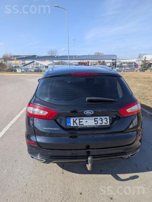 Black Ford Mondeo 2015 in Cesis, with an engine capacity of 2.00 L and mileage of 380 thousand km for 7255 €, photo 8 on AUTOMOTO.COM.LV