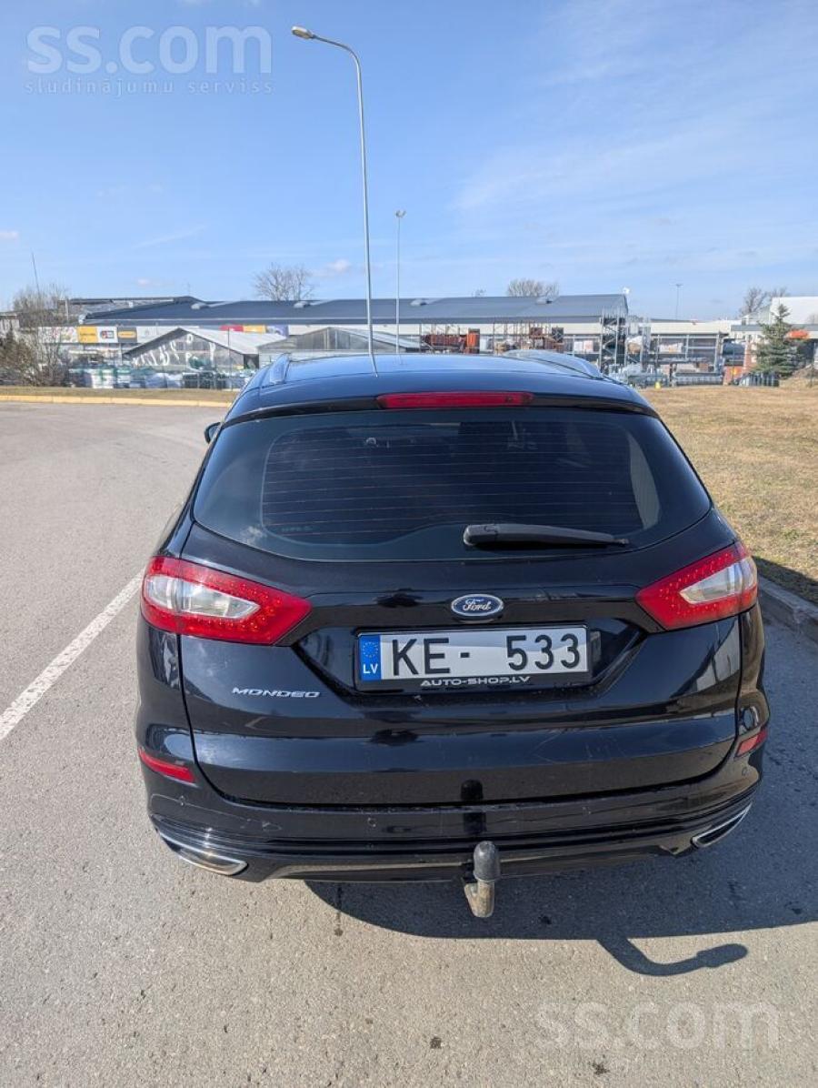 Black Ford Mondeo 2015 in Cesis, with an engine capacity of 2.00 L and mileage of 380 thousand km for 7255 €, photo 8 on AUTOMOTO.COM.LV