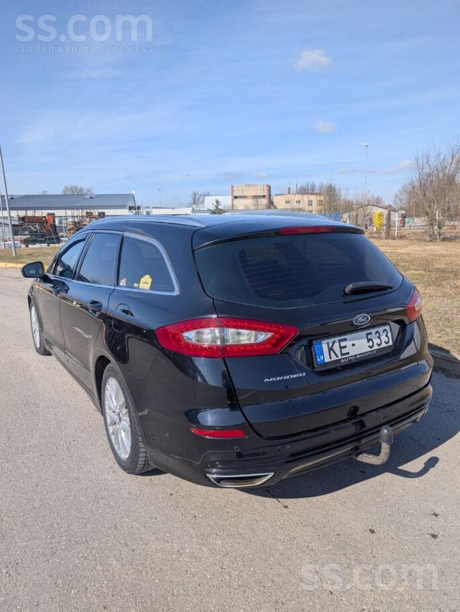Black Ford Mondeo 2015 in Cesis, with an engine capacity of 2.00 L and mileage of 380 thousand km for 7255 €, photo 9 on AUTOMOTO.COM.LV