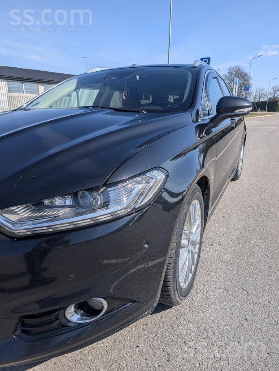 Black Ford Mondeo 2015 in Cesis, with an engine capacity of 2.00 L and mileage of 380 thousand km for 7255 €, photo 10 on AUTOMOTO.COM.LV