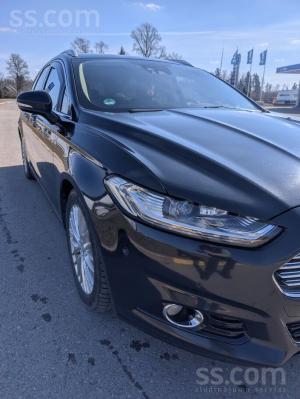 Black Ford Mondeo 2015 in Cesis, with an engine capacity of 2.00 L and mileage of 380 thousand km for 7255 €, photo 11 on AUTOMOTO.COM.LV