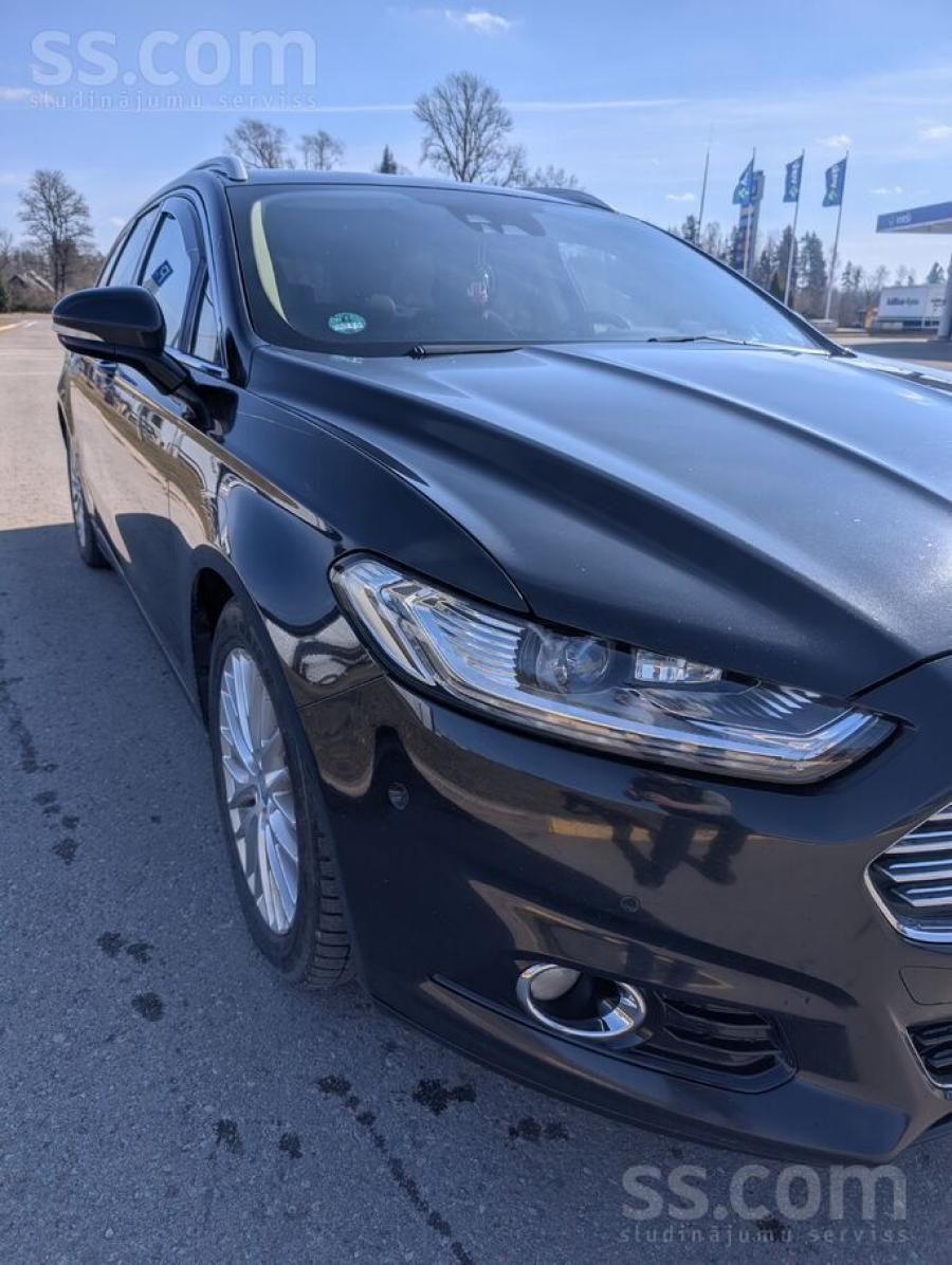 Black Ford Mondeo 2015 in Cesis, with an engine capacity of 2.00 L and mileage of 380 thousand km for 7255 €, photo 11 on AUTOMOTO.COM.LV
