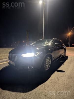 Black Ford Mondeo 2015 in Cesis, with an engine capacity of 2.00 L and mileage of 380 thousand km for 7255 €, photo 12 on AUTOMOTO.COM.LV
