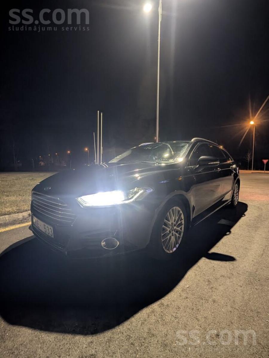 Black Ford Mondeo 2015 in Cesis, with an engine capacity of 2.00 L and mileage of 380 thousand km for 7255 €, photo 12 on AUTOMOTO.COM.LV