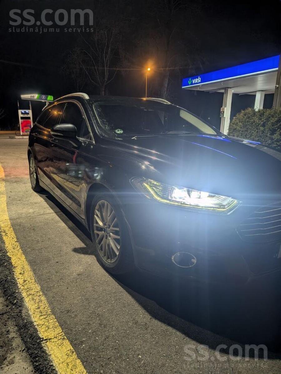 Black Ford Mondeo 2015 in Cesis, with an engine capacity of 2.00 L and mileage of 380 thousand km for 7255 €, photo 13 on AUTOMOTO.COM.LV