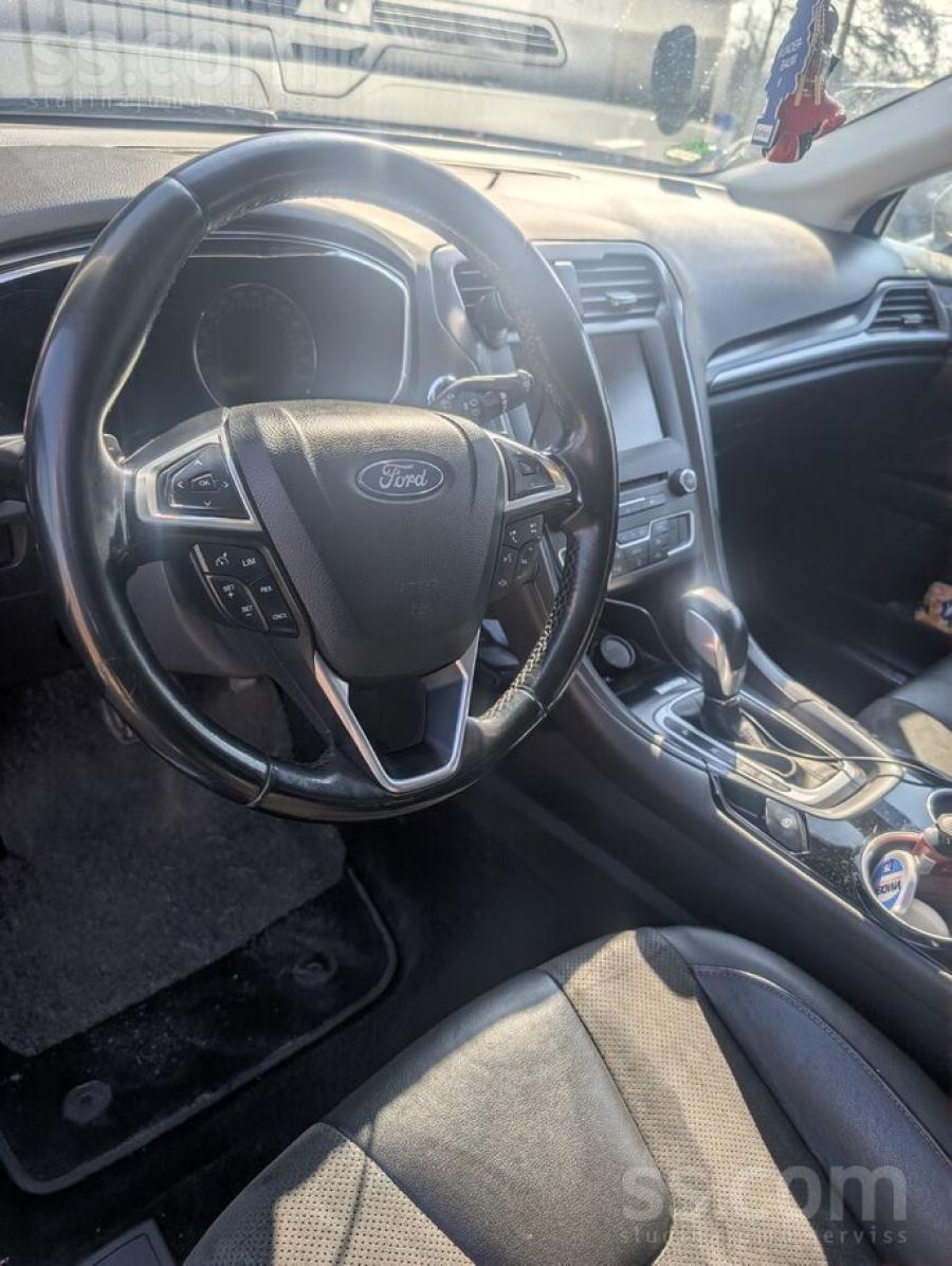 Black Ford Mondeo 2015 in Cesis, with an engine capacity of 2.00 L and mileage of 380 thousand km for 7255 €, photo 20 on AUTOMOTO.COM.LV
