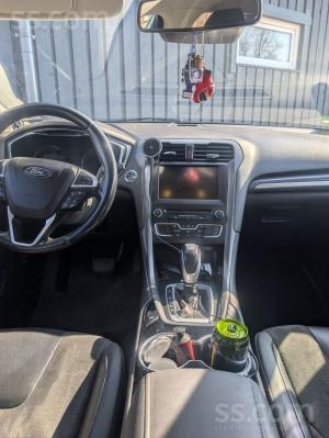 Black Ford Mondeo 2015 in Cesis, with an engine capacity of 2.00 L and mileage of 380 thousand km for 7255 €, photo 21 on AUTOMOTO.COM.LV