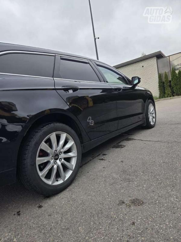 Black Ford Mondeo 2015 in Kaunas, with an engine capacity of 1.60 L and mileage of 235 thousand km for 8000 €, photo 2 on AUTOMOTO.COM.LV