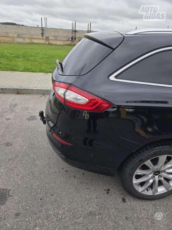 Black Ford Mondeo 2015 in Kaunas, with an engine capacity of 1.60 L and mileage of 235 thousand km for 8000 €, photo 5 on AUTOMOTO.COM.LV