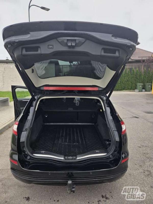 Black Ford Mondeo 2015 in Kaunas, with an engine capacity of 1.60 L and mileage of 235 thousand km for 8000 €, photo 7 on AUTOMOTO.COM.LV