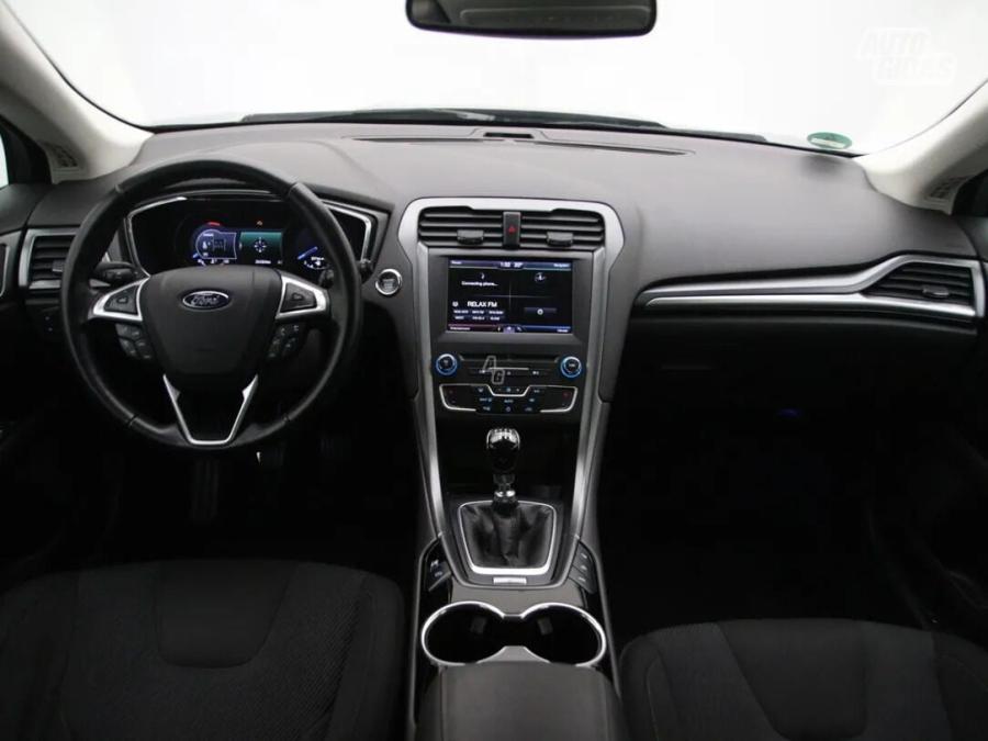 Black Ford Mondeo 2015 in Vilnius, with an engine capacity of 2.00 L and mileage of 254 thousand km for 7599 €, photo 3 on AUTOMOTO.COM.LV