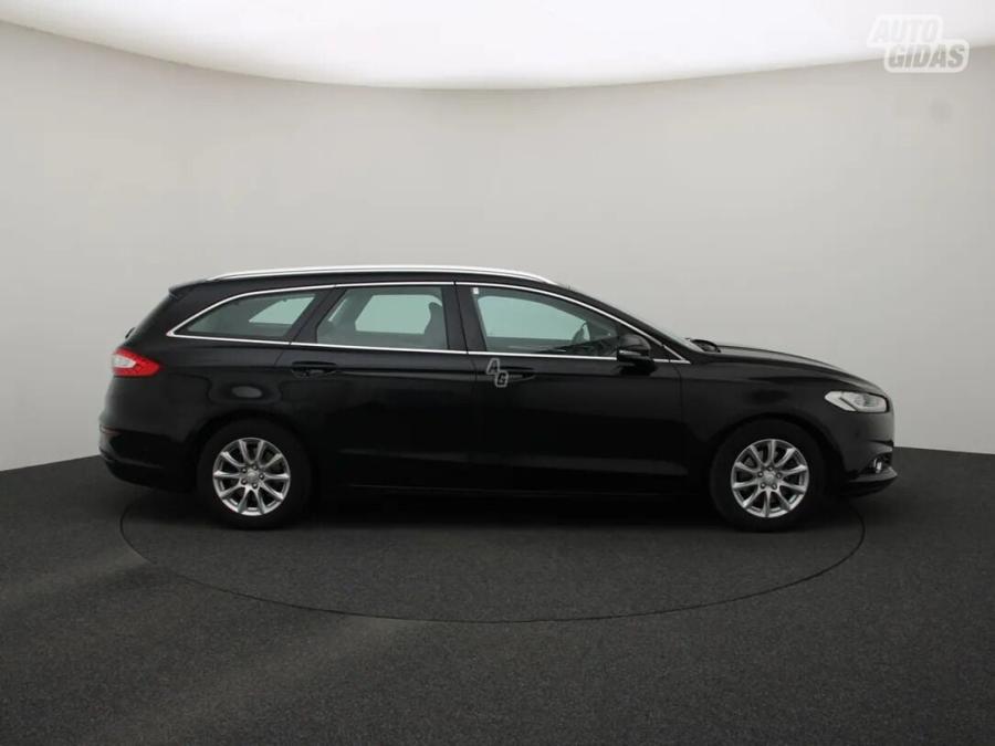 Black Ford Mondeo 2015 in Vilnius, with an engine capacity of 2.00 L and mileage of 254 thousand km for 7599 €, photo 10 on AUTOMOTO.COM.LV