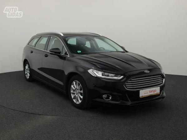 Black Ford Mondeo 2015 in Vilnius, with an engine capacity of 2.00 L and mileage of 254 thousand km for 7599 €, photo 10 on AUTOMOTO.COM.LV
