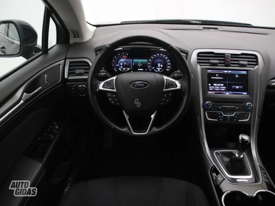 Black Ford Mondeo 2015 in Vilnius, with an engine capacity of 2.00 L and mileage of 254 thousand km for 7599 €, photo 18 on AUTOMOTO.COM.LV