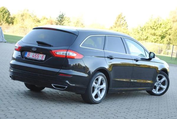 Black Ford Mondeo 2015 in Riga, with an engine capacity of 2.00 L and mileage of 240 thousand km for 8990 €, photo 2 on AUTOMOTO.COM.LV
